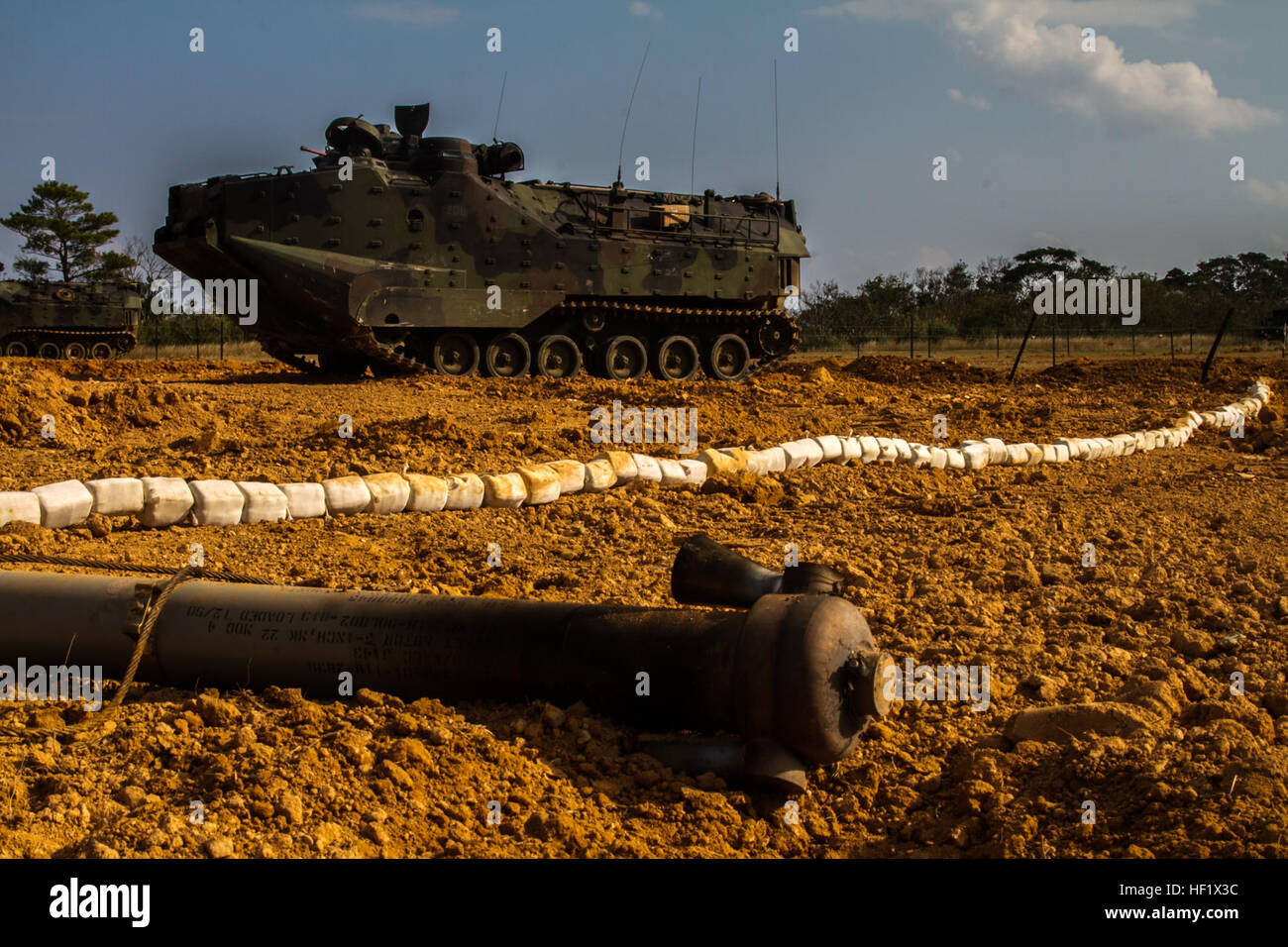 A Mine-clearing line charge lies off to the side as an Amphibious ...