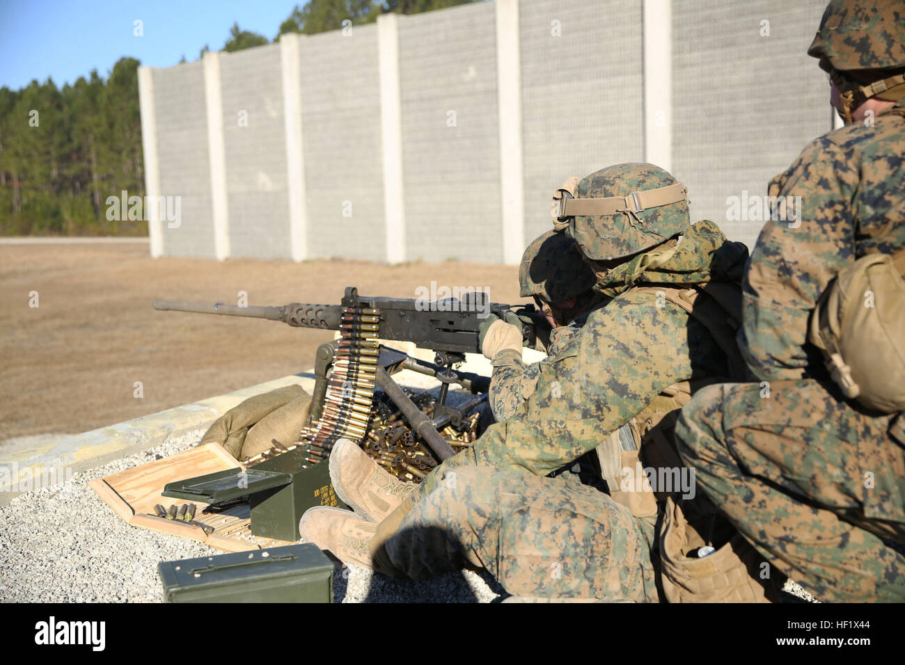 A Marine with 2nd Marine Logistics Group fires an M2 Browning .50 ...