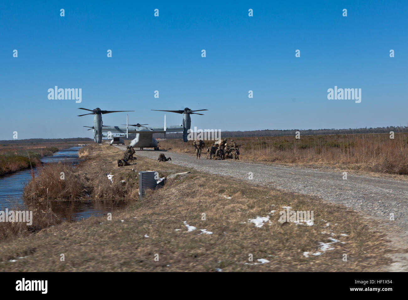 U.S. Marines with Kilo Company, 3rd Battalion, 6th Marine Regiment post ...