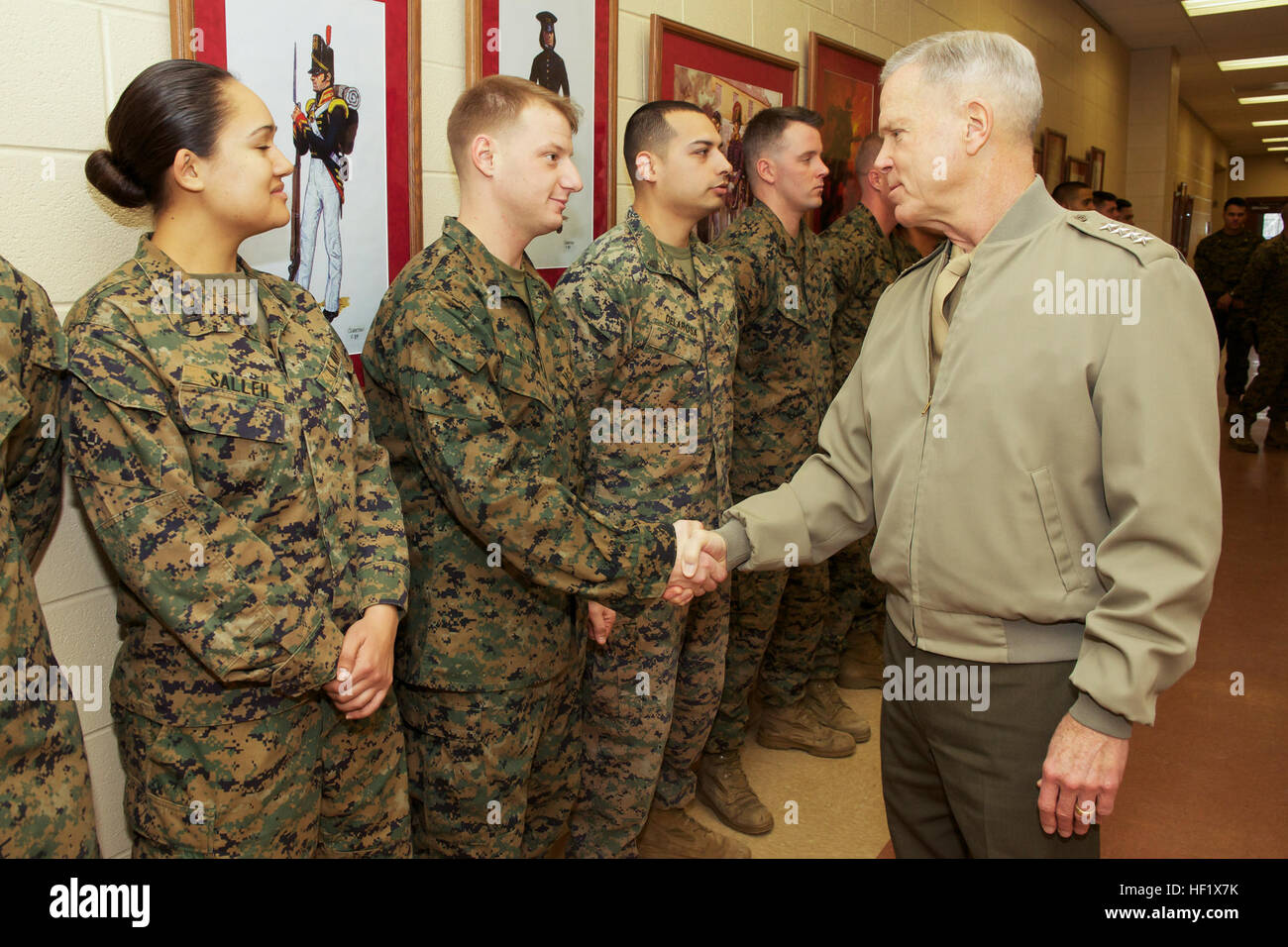 The 35th Commandant of the Marine Corps, Gen. James F. Amos, right ...