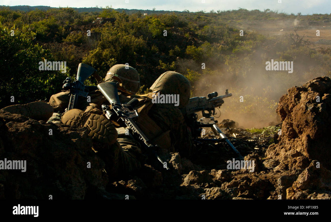 U.S. Marine Corps Pfc. Daniel Stillwell (right), a machine gunner ...