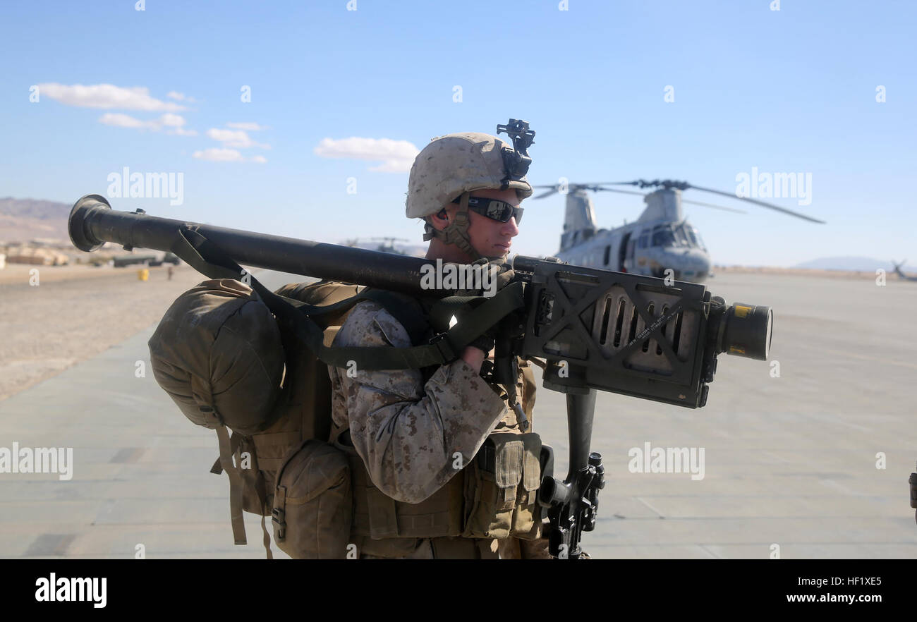 A Marine with 3rd Low Altitude Air Defense Battalion carries a stinger ...