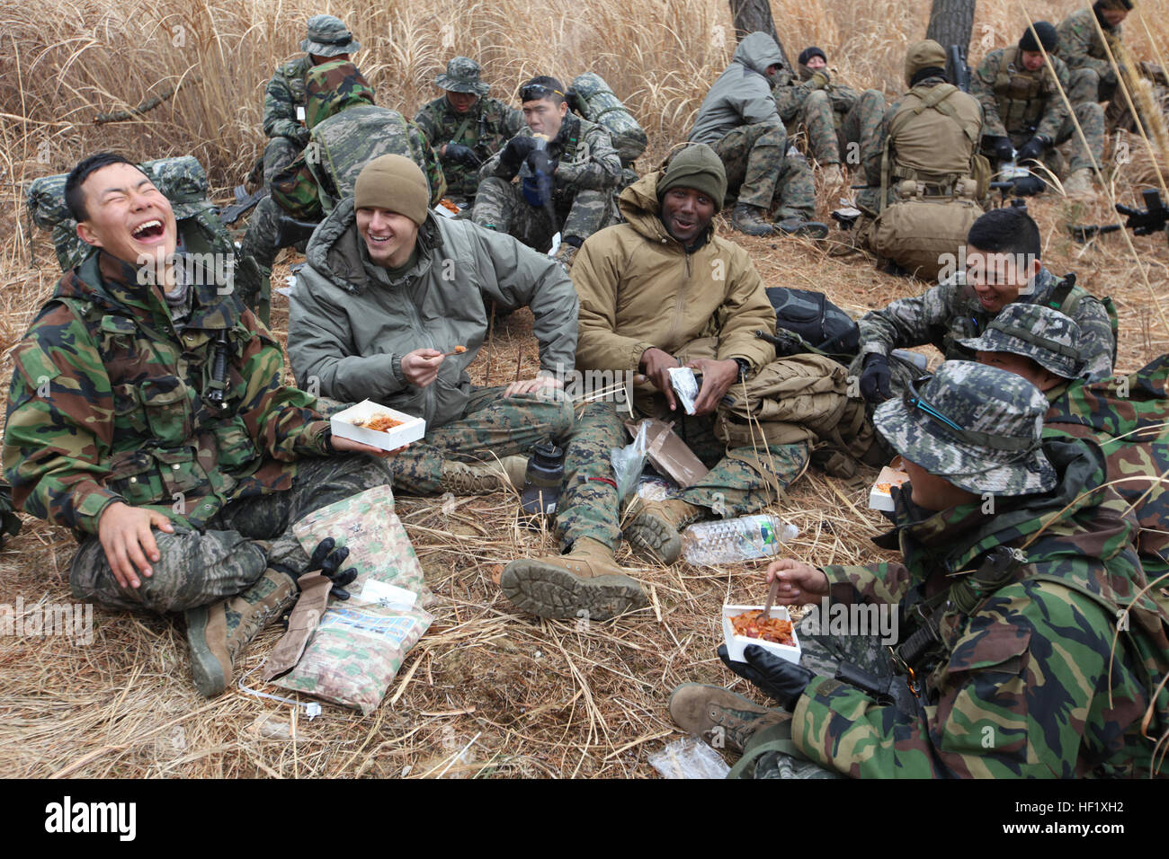 U.S. Marines enjoy a quick lunch with Republic of Korea Marines Feb. 6 ...