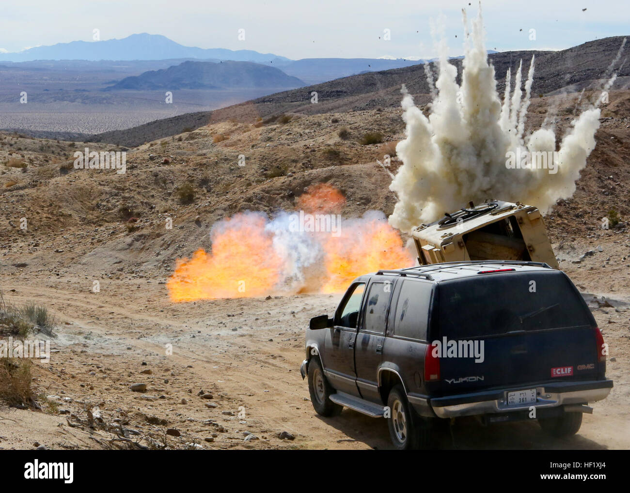 Role players for the Marine Corps drive through a simulated Improvised ...