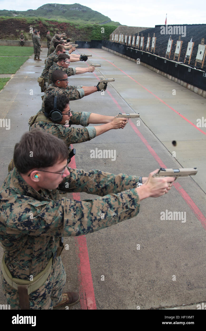 Marines fire their M45A1 close-quarters battle pistols from short range ...