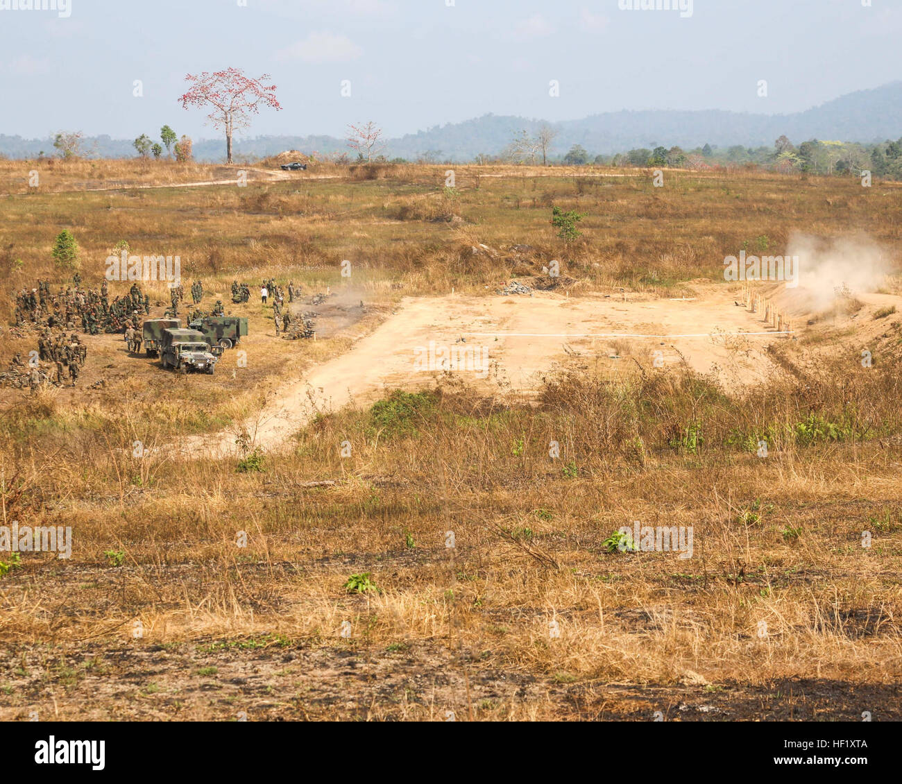 Royal Thai and U.S. Marines fire their service rifles during a battle ...
