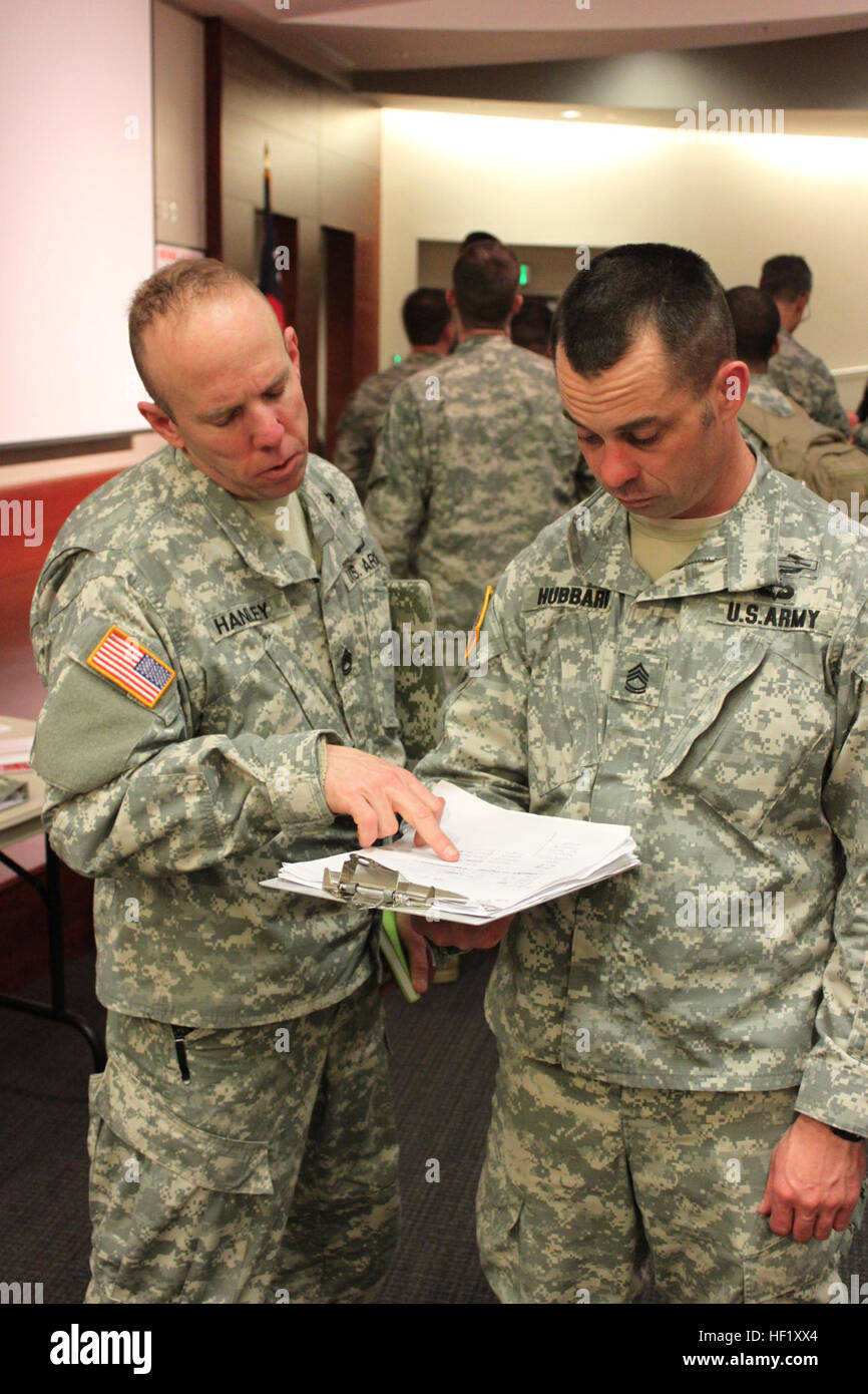 Georgia Guardsmen receive a mission brief before patrolling the streets ...
