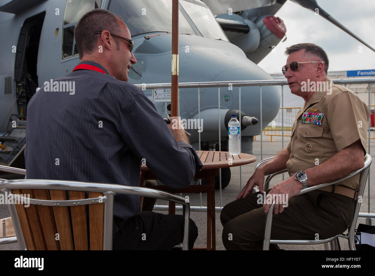 A news reporter from Reuters interviews U.S. Marine Corps Lt Gen Terry ...