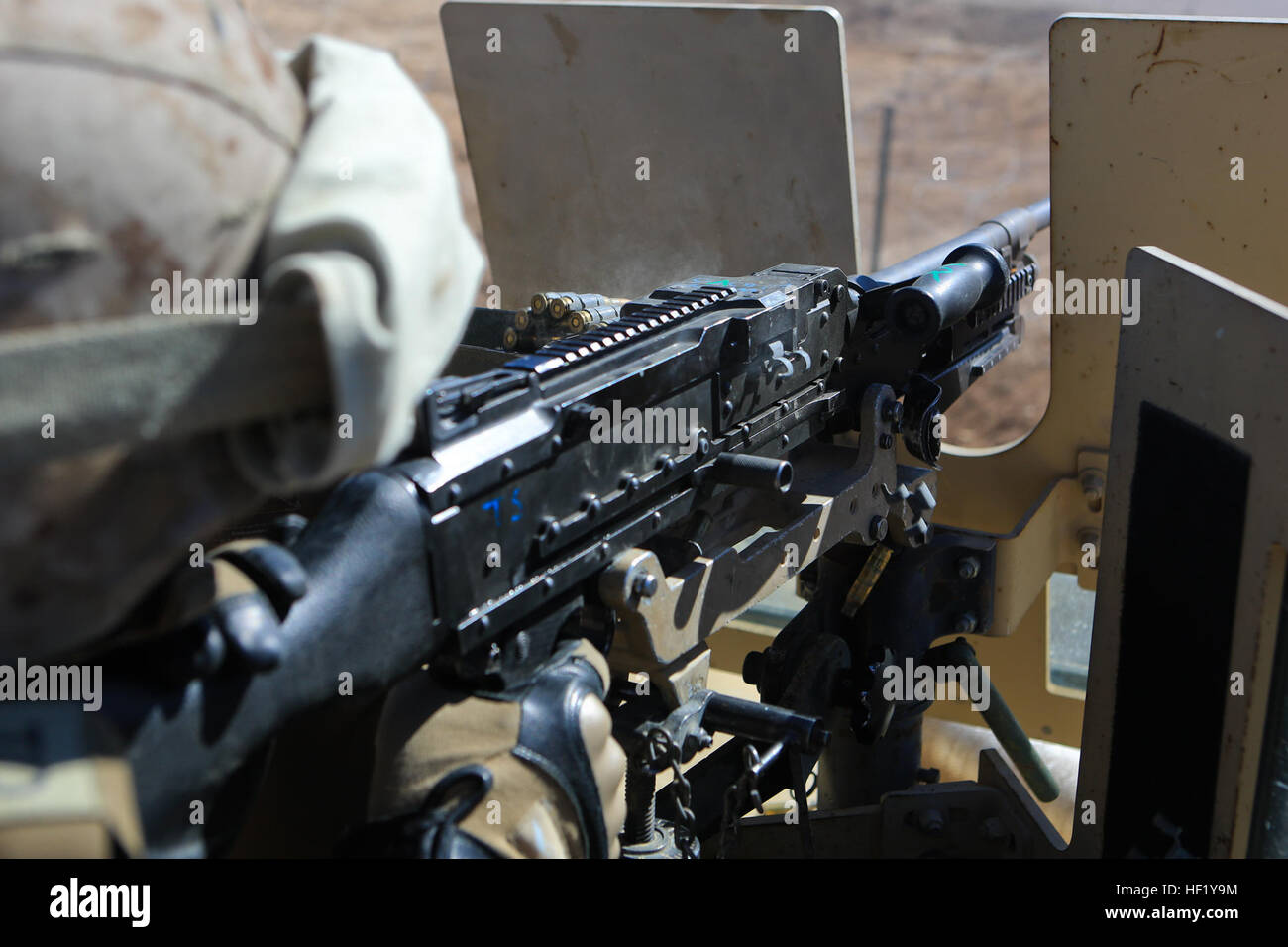U.S. Navy corpsman assigned to Combat Logistics Battalion 7 fires the ...