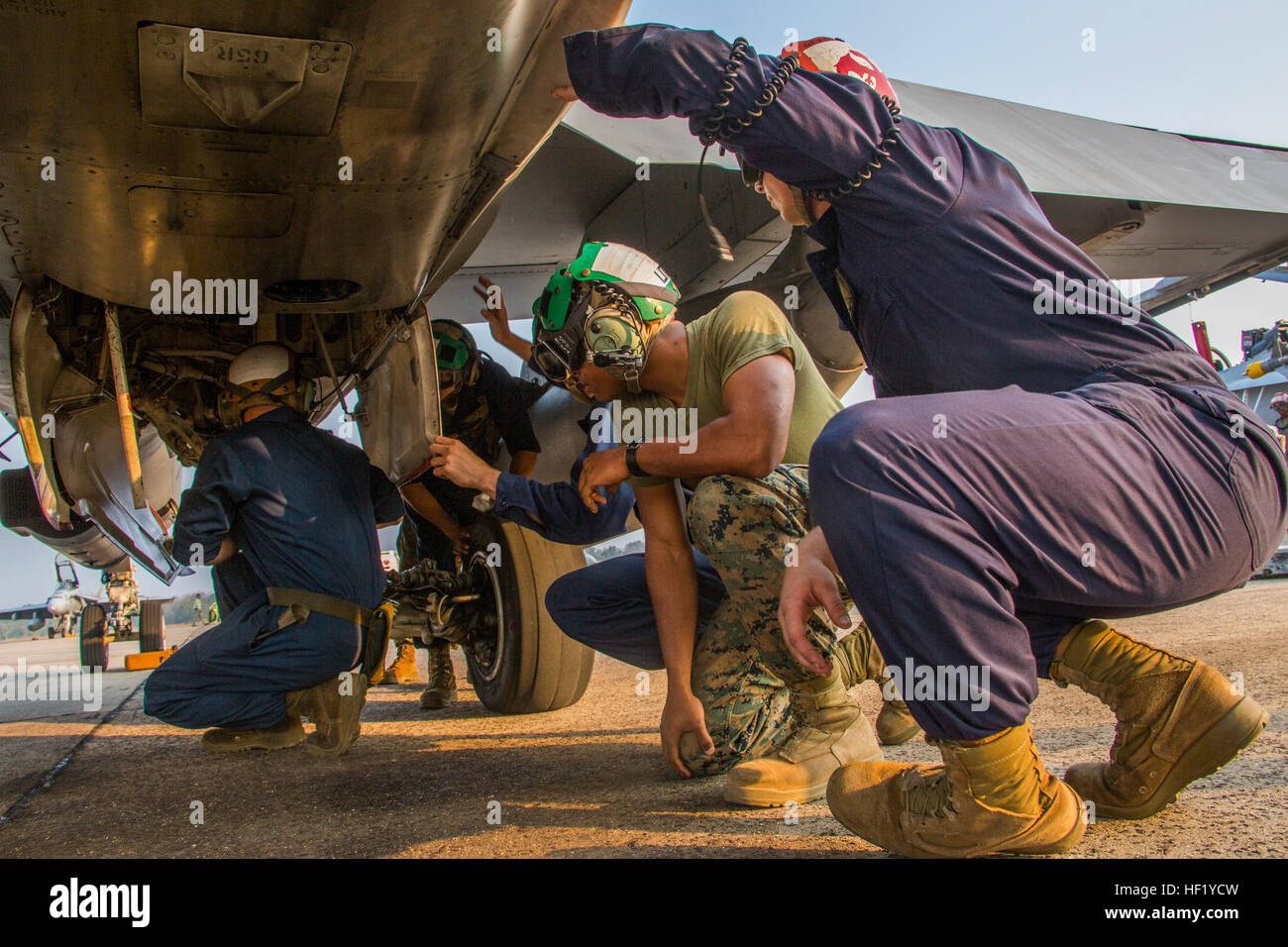 Marines troubleshoot an igniter on an FA-18D Hornet aboard Wing One ...