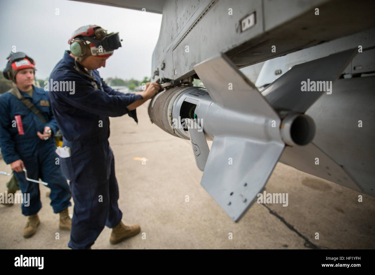 Lance Cpl. Casey Boatman performs a safety check on an MK-82 general ...