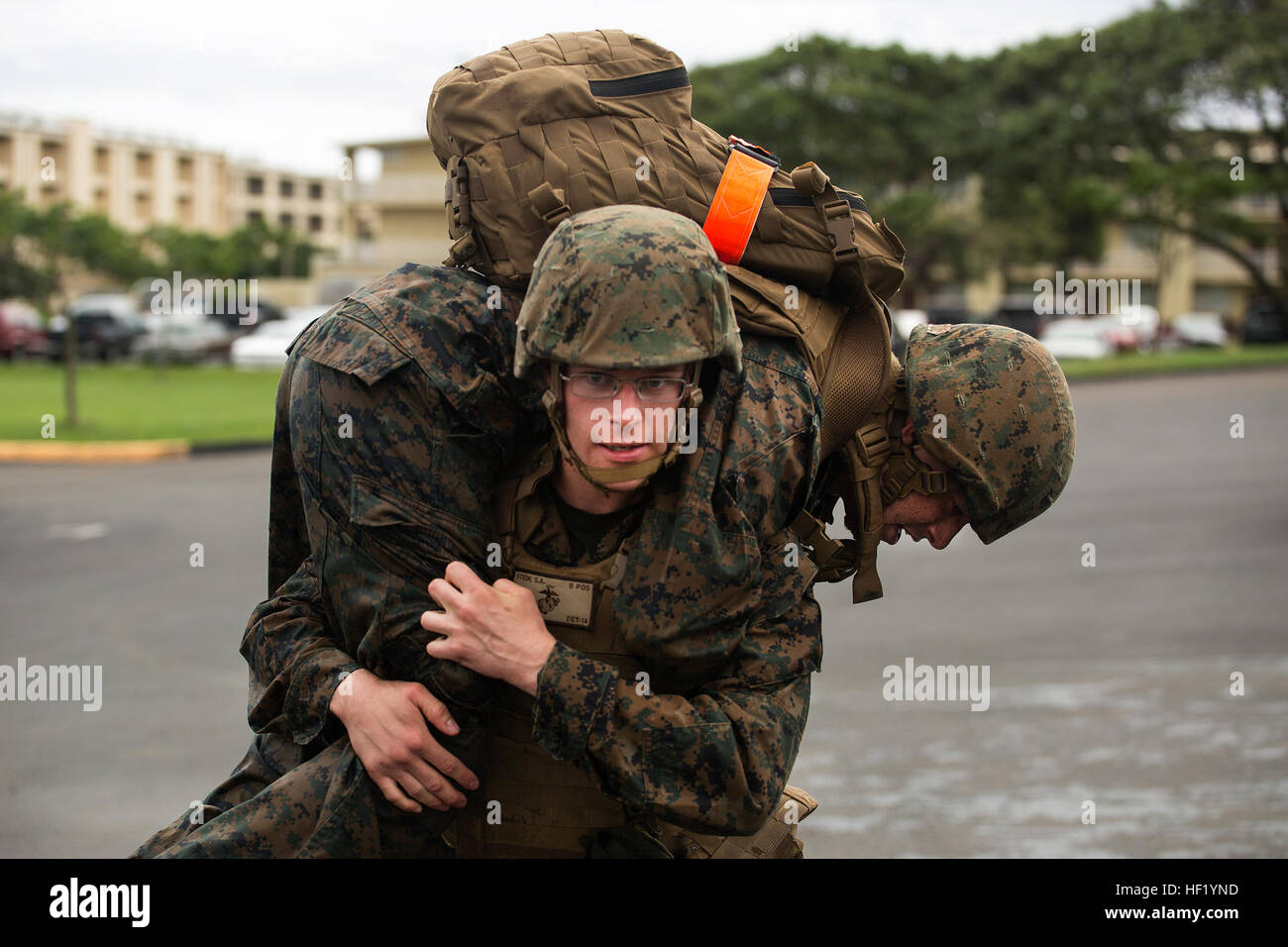 Cpl. Sean Stein, an operator with 3rd Radio Battalion, fireman carries ...
