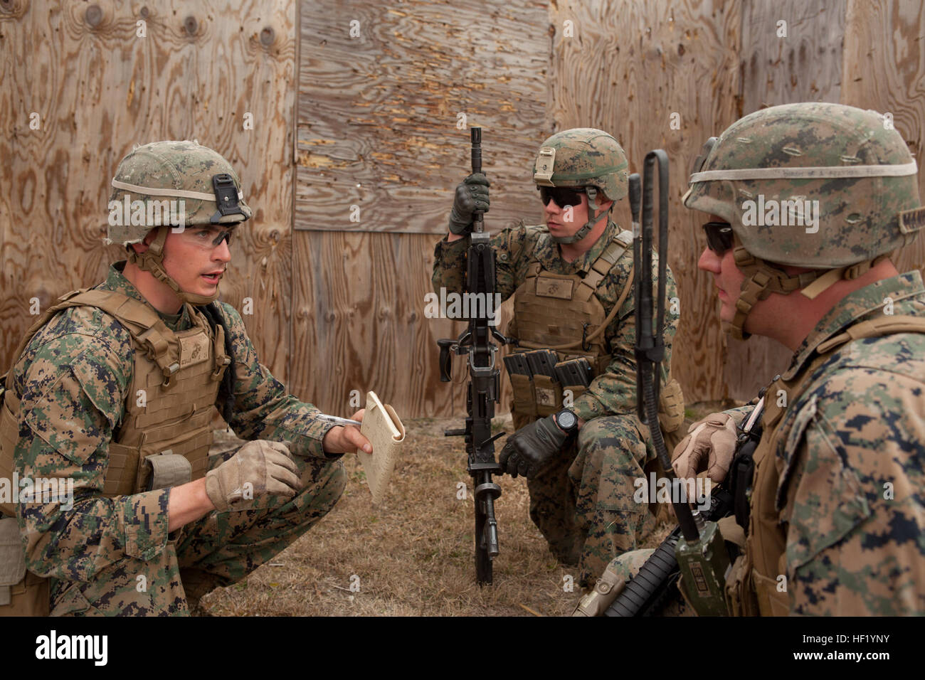 U.S. Marine Corps Cpl. Joseph Canty, left, section leader, 2nd Battalion, 8th Marine Regiment ...