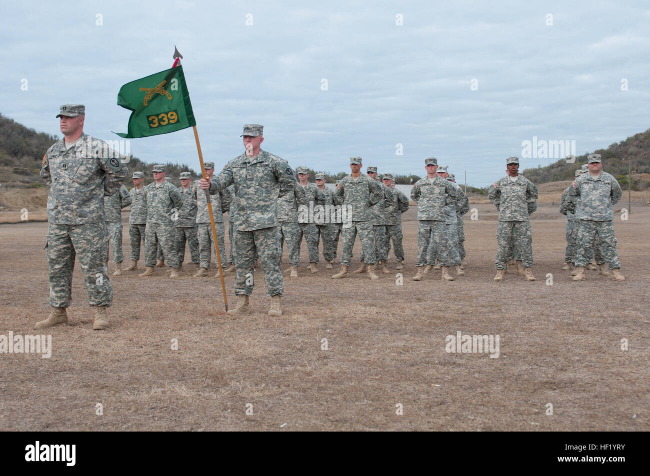 U.S. soldiers with the 339th Military Police Company stand attentive ...