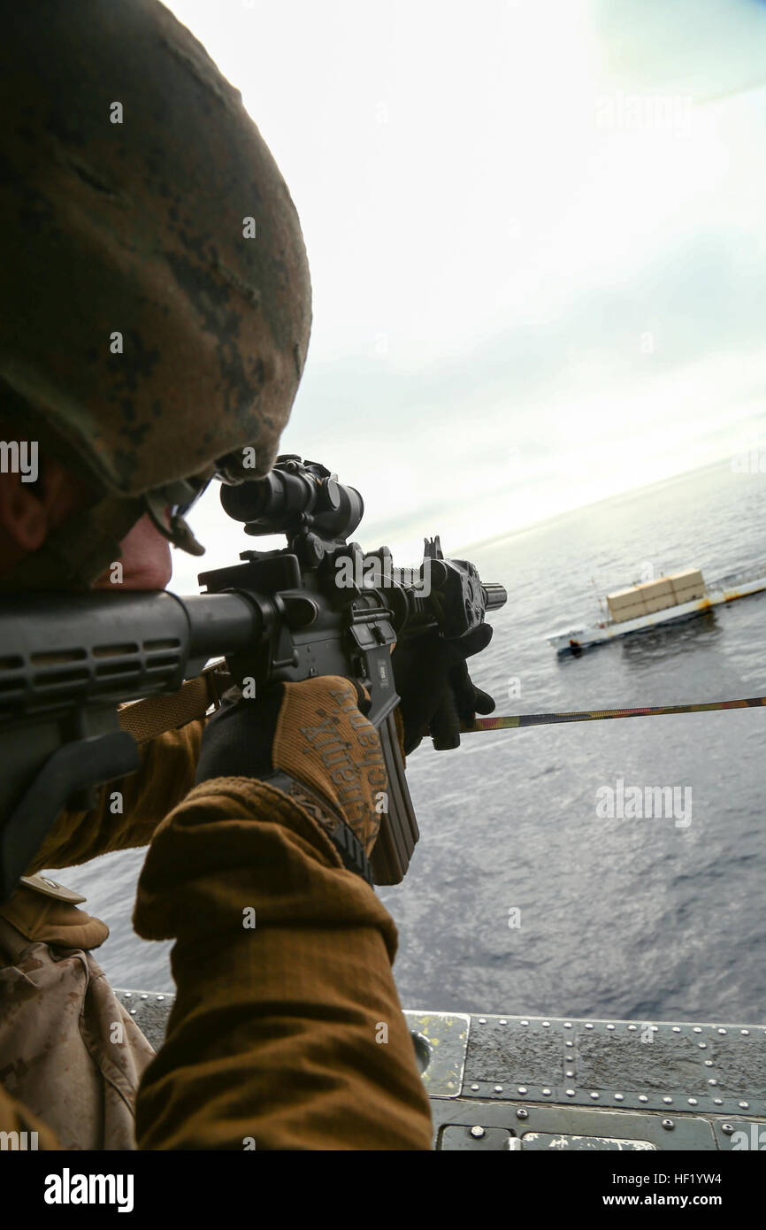 A Marine sniper with the Maritime Raid Force (MRF), 11th Marine ...