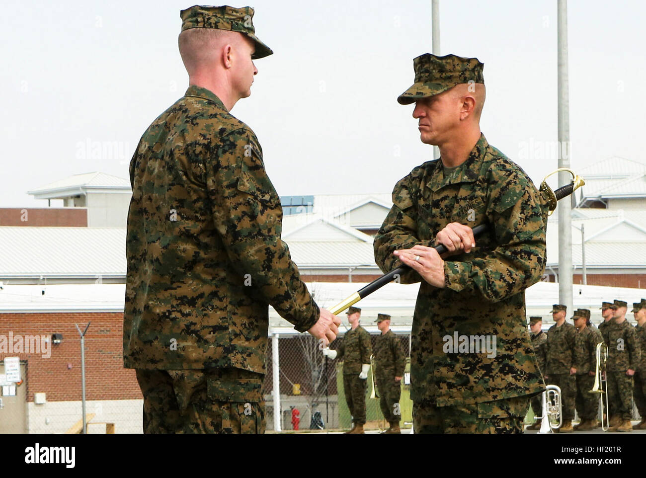 Sergeant Maj. Jonathan D. Martin (right) takes charge as the battalion ...