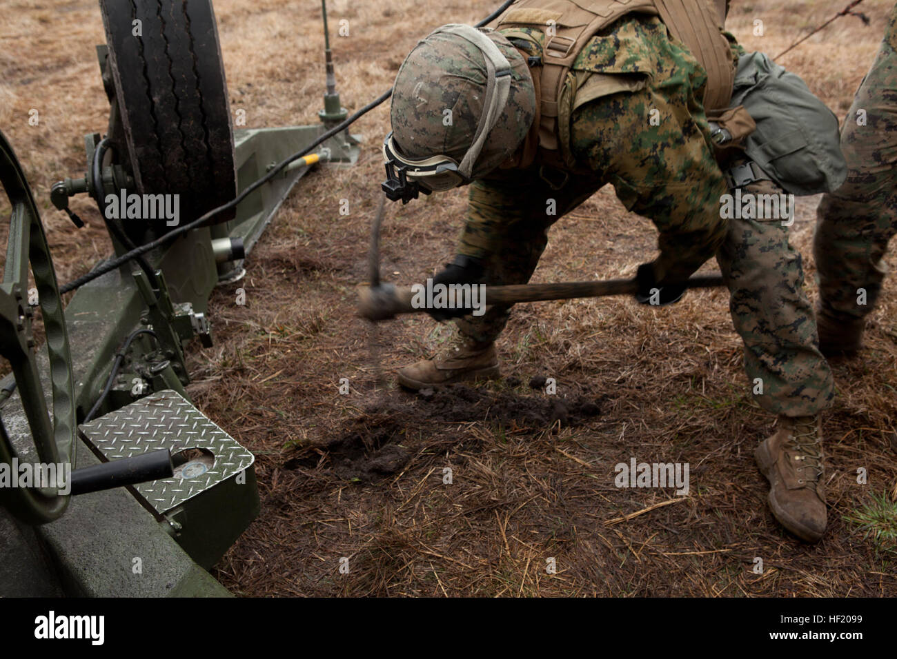 U.S. Marine Corps Lance Cpl. Dave Rattigan, field artillery cannoneer ...