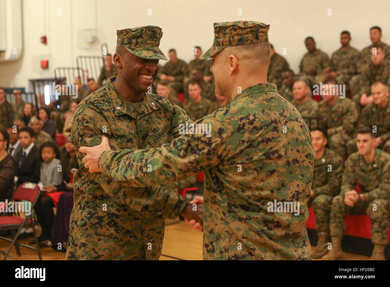 Lieutenant Col. James A. Ryans II (left) congratulates the new ...