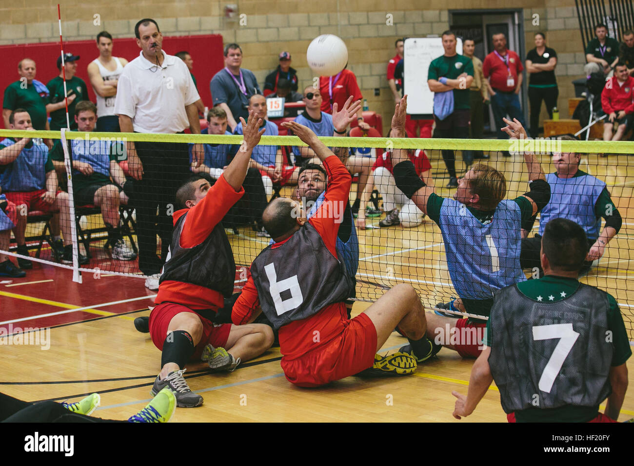 Athletes from Team Allies and Team Colombia compete in the Sitting ...