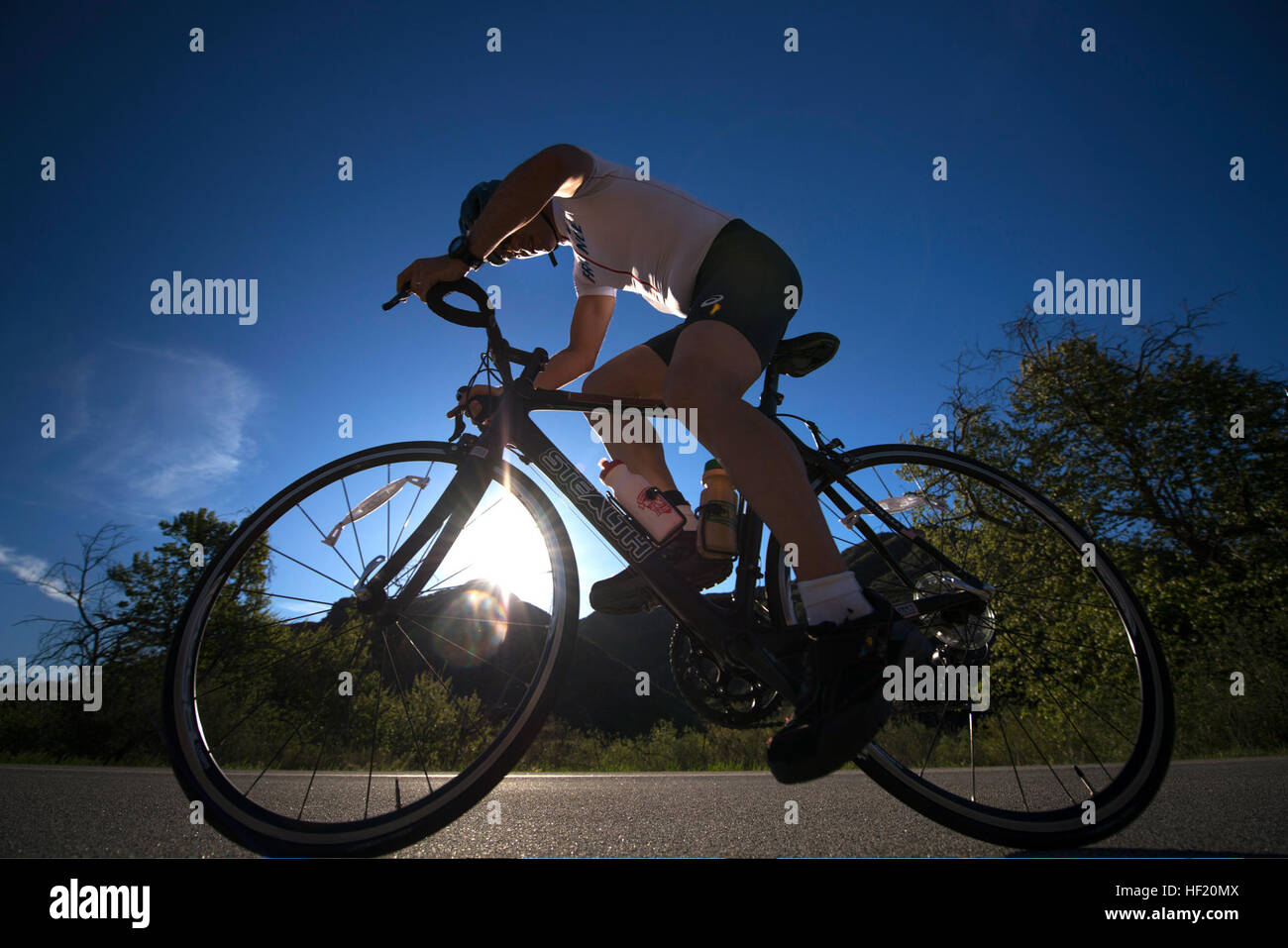 An international athlete competes in the upright-cycle competition for ...