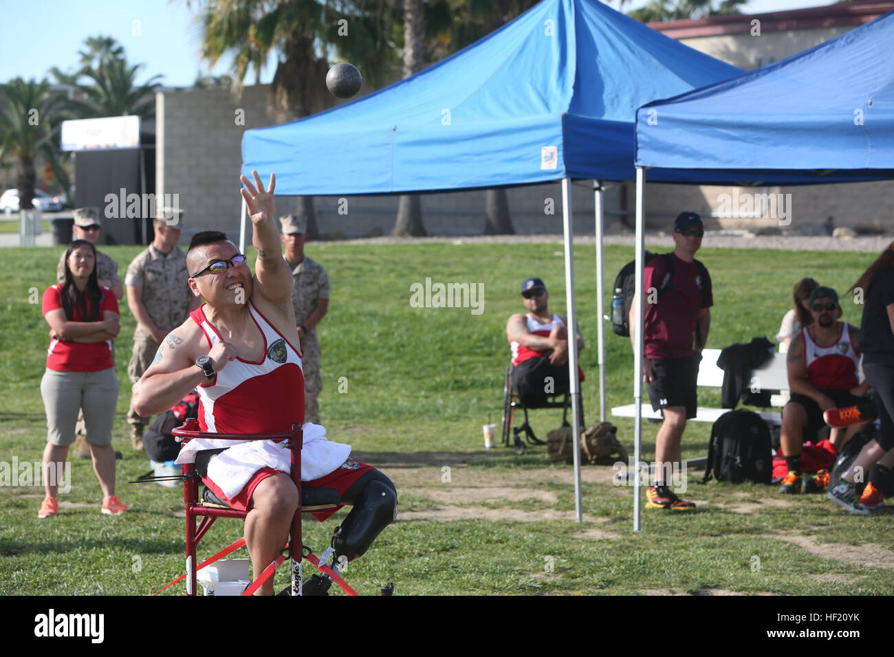 Veteran Mark Seifert, 30, from Forrest Lake, Minn., throws the shot put ...