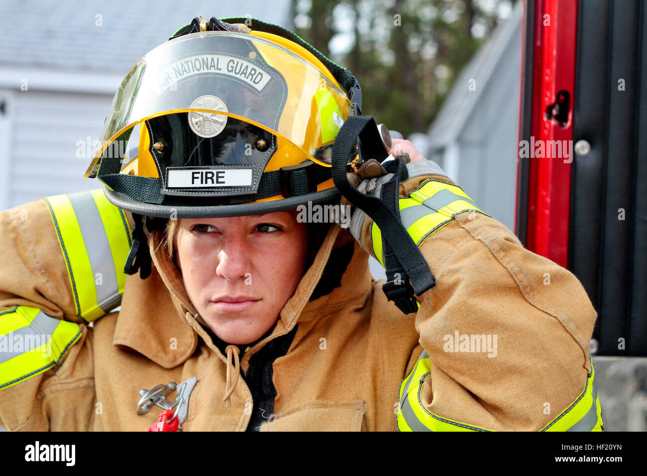 U.S. Air Force Airman 1st Class Litza De Jesus puts on protective gear ...