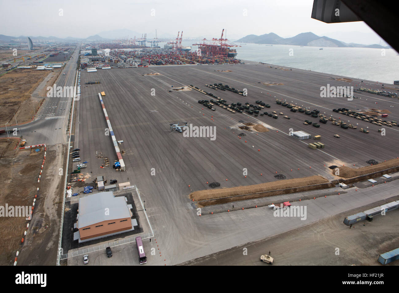 Aerial view of Guang Yang Port from MV-22 Osprey, with Marine Medium ...