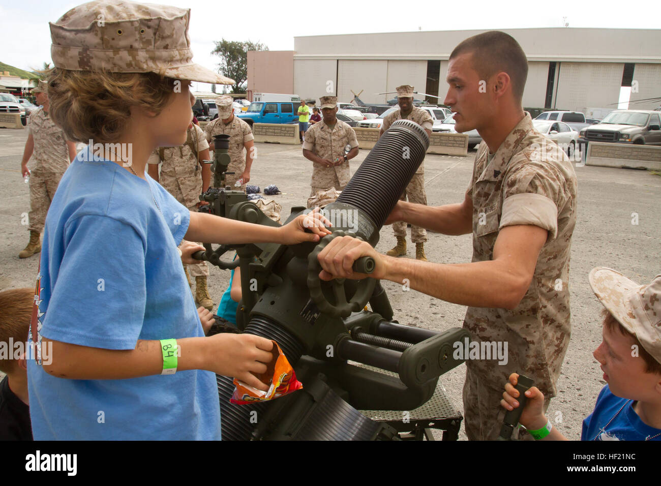U.S. Marine Corps Cpl. Daniel Rausch, a field artillery cannoneer ...