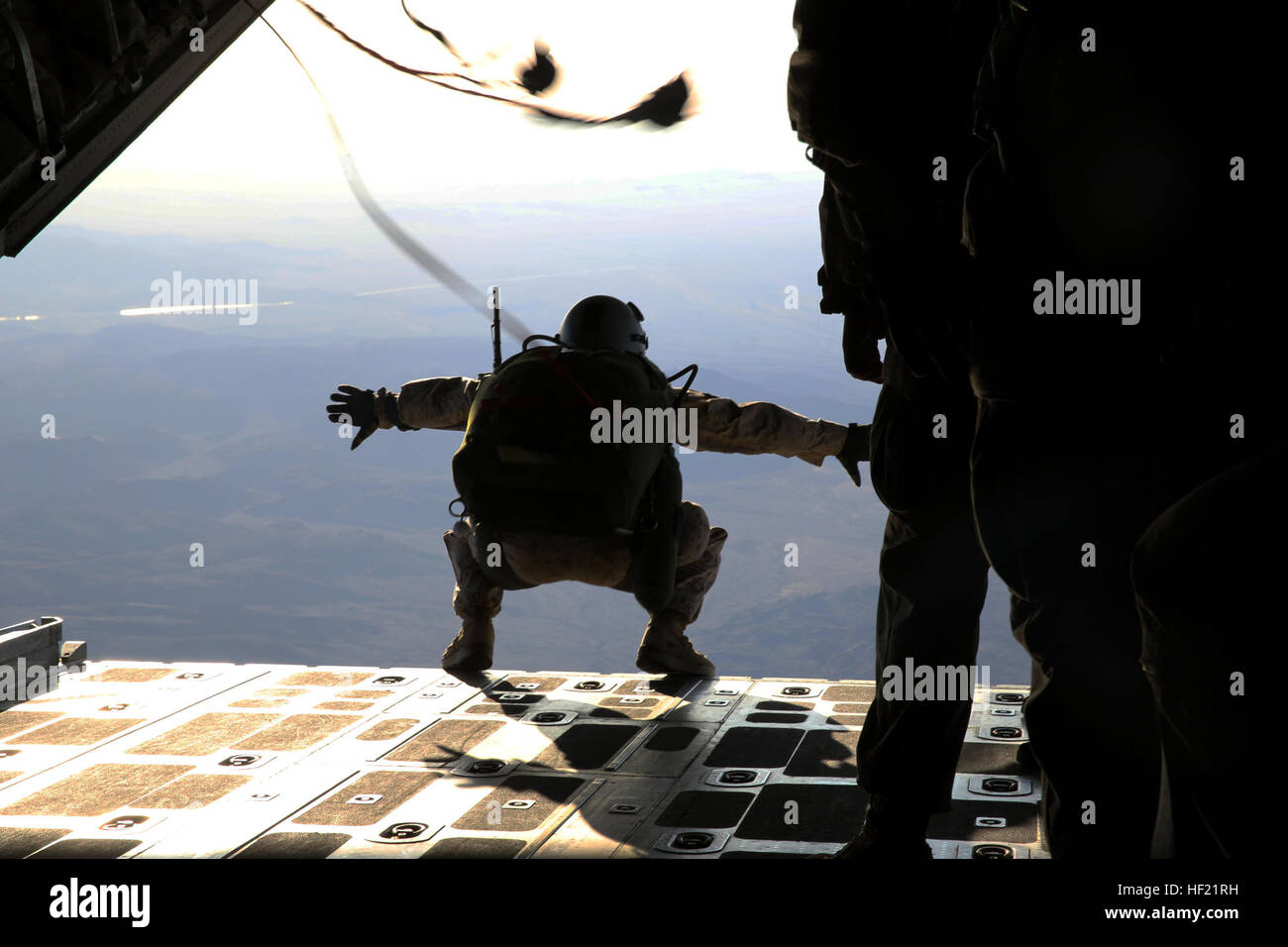 A Marine with Bravo Company, 1st Reconnaissance Battalion, jumps out of ...