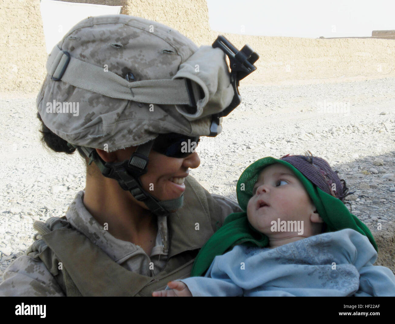 Corporal Ericka L. Garcia comforts an Afghan baby during a recent ...