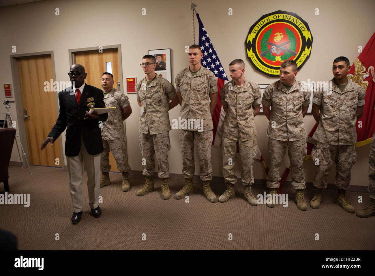 U.S. Marine Corps Sgt. Maj. E. L. Mayfield (Ret.), speaks with U.S ...