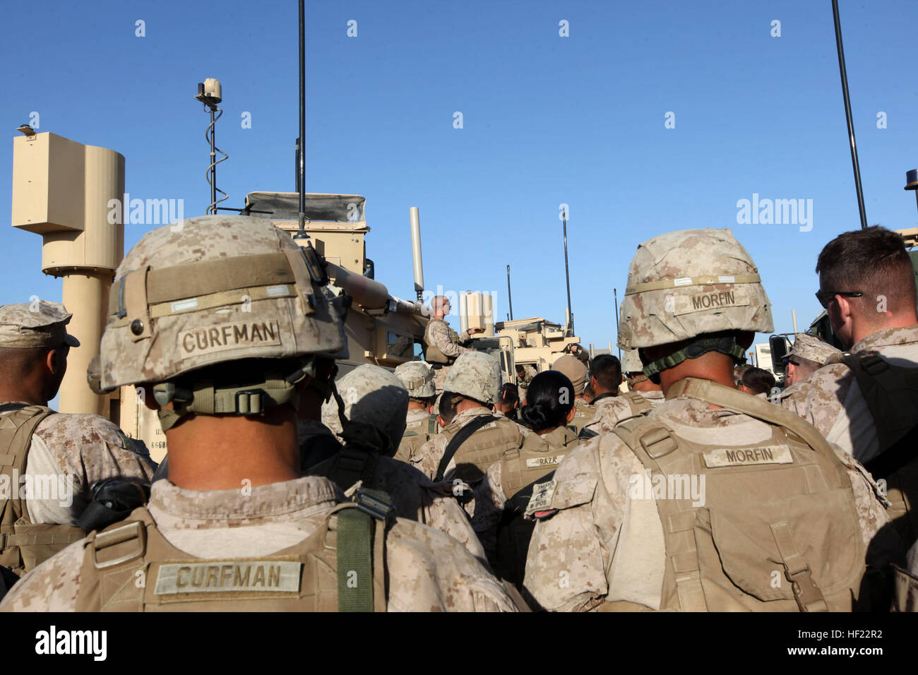 Marines with Combat Logistics Battalion 7 listen to a convoy brief ...