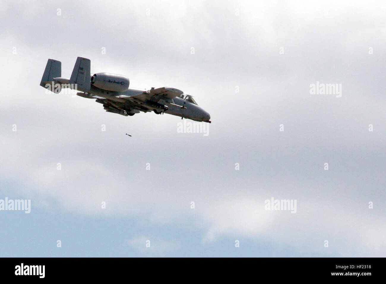 An A-10 Thunderbolt II drops a BDU-33, a practice bomb, at the Grayling ...