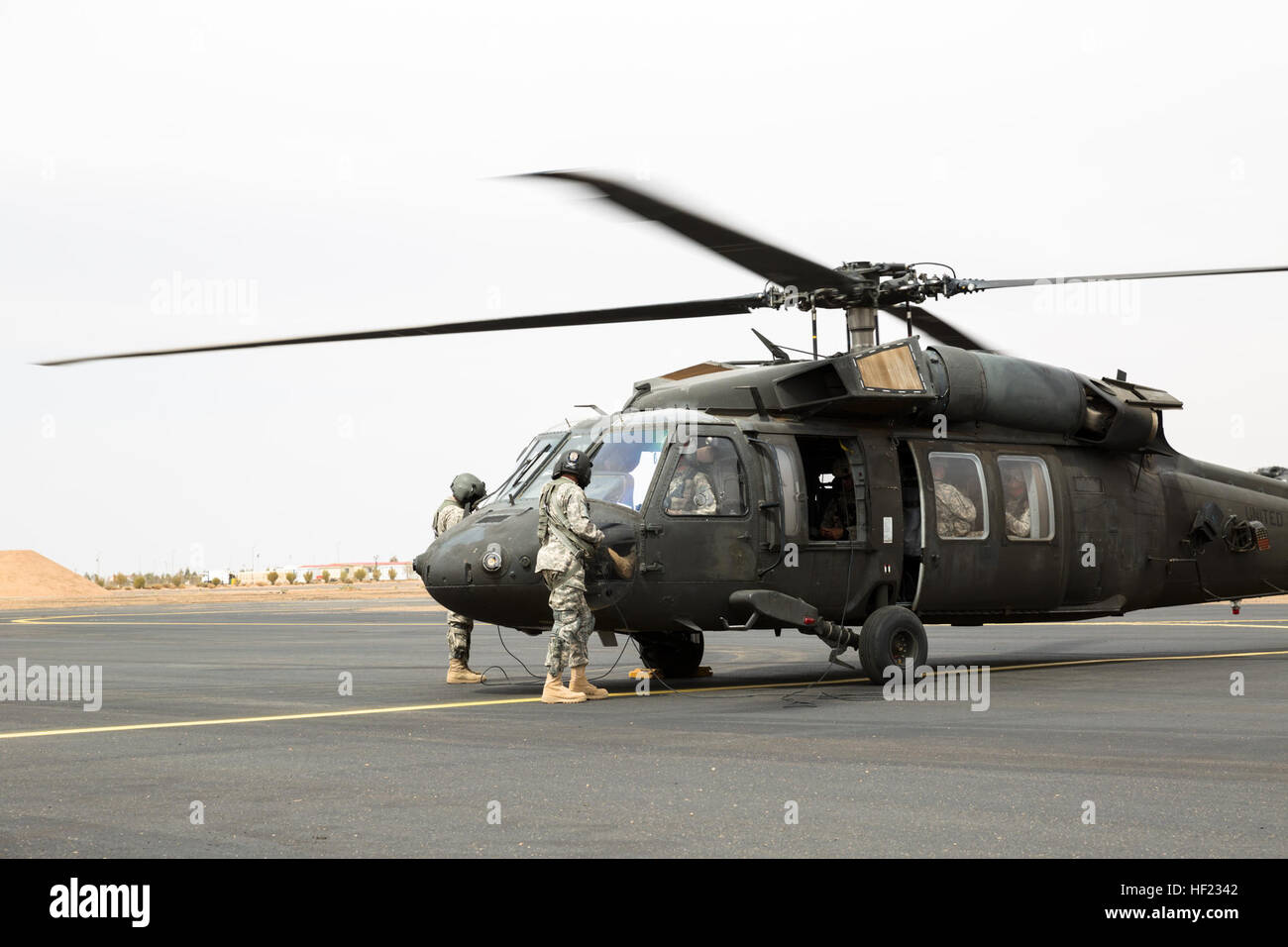 U.S. Army UH-60 Black Hawk crew chiefs from Company A, 3rd Battalion ...