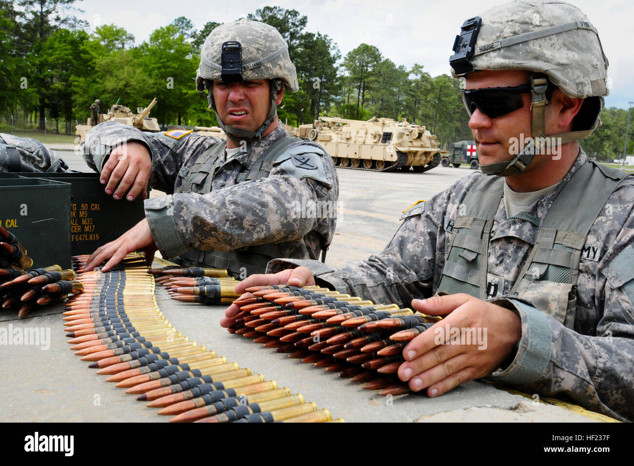 U.S. Army Staff Sgt. Russell Williams (left) and Capt. David House ...