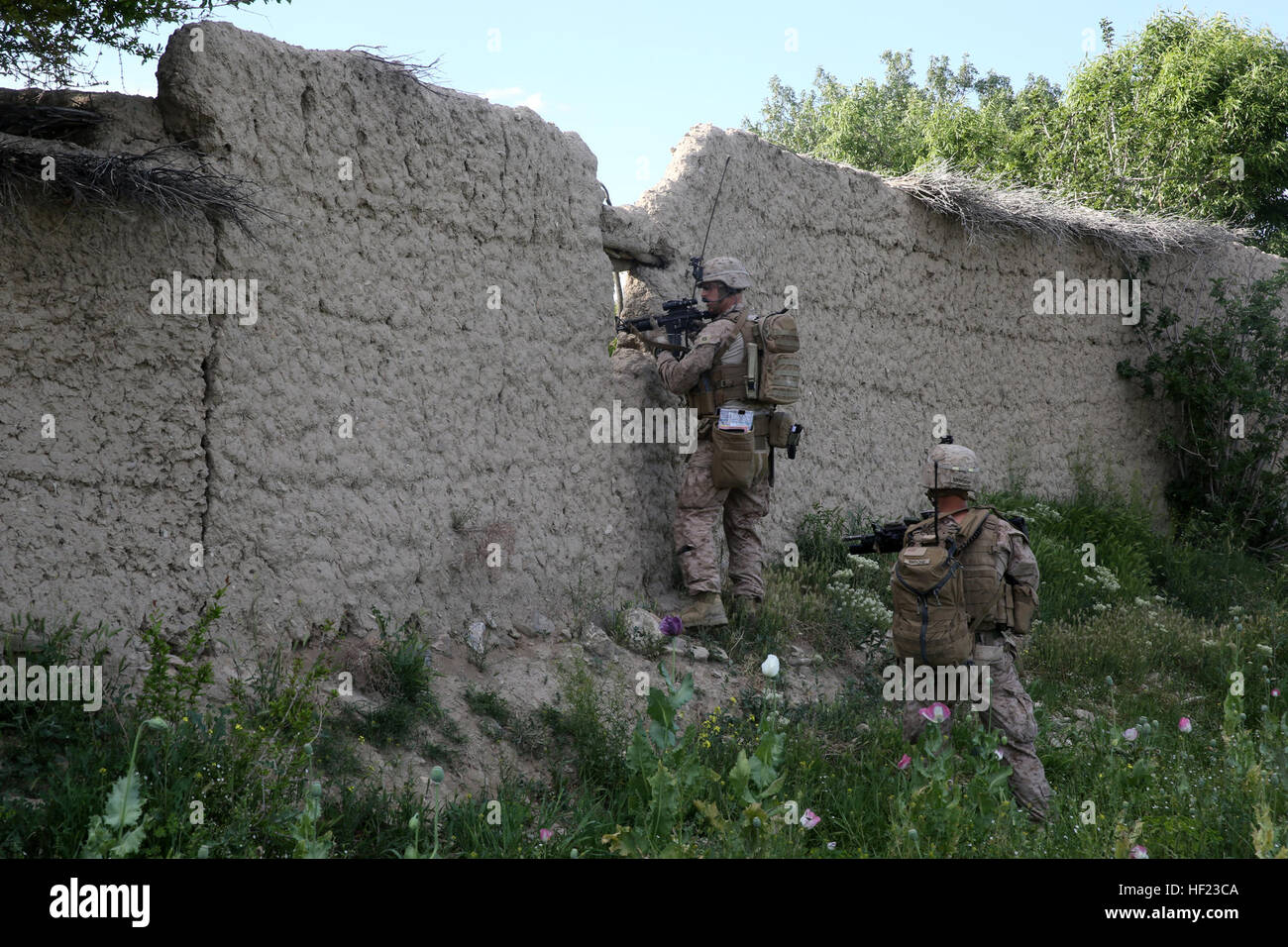 U.S. Marine Corps Capt. Scott Stewart, left, the commanding officer of ...