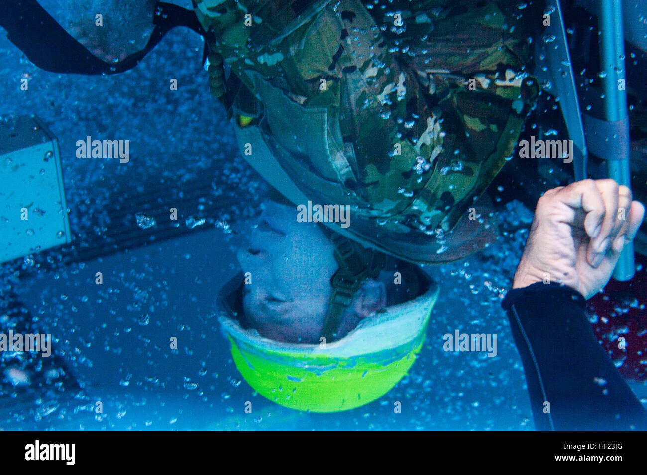 An airman assigned to the 129th Rescue Wing in the Air National Guard ...