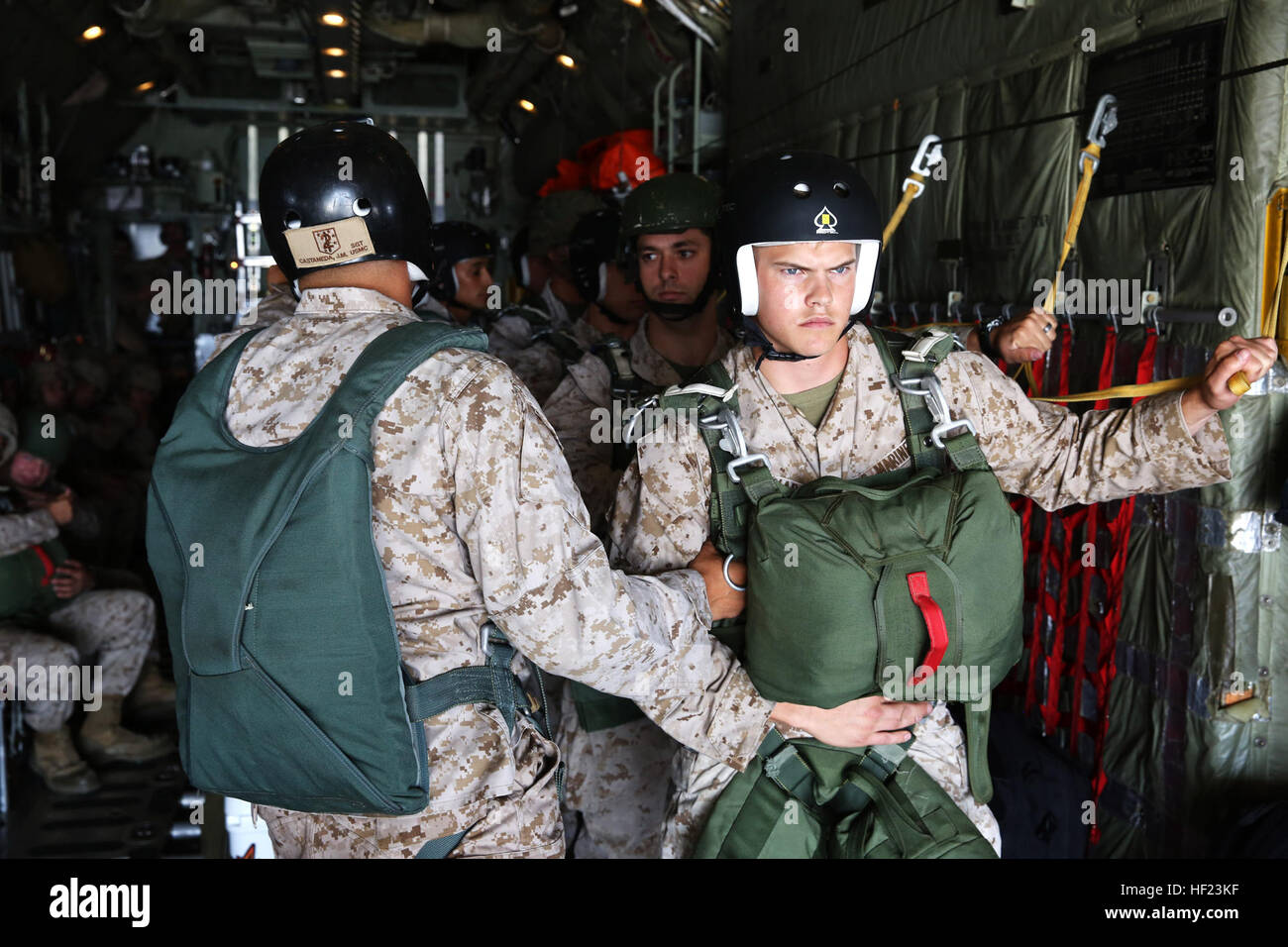 The second stick of Marines on the joint-unit static-line jump prepares ...
