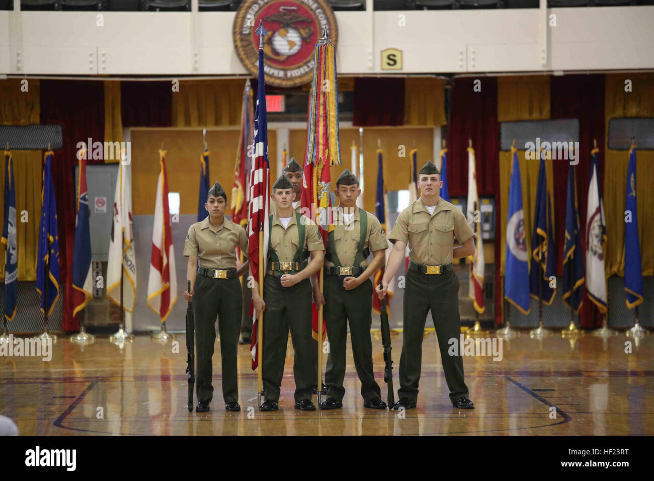 The 10th Marine Regiment color guard, stands at parade rest proudly ...