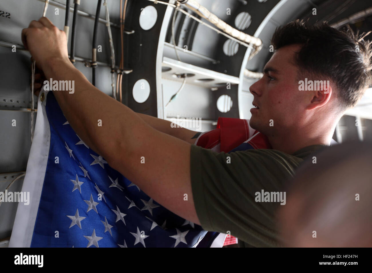 Corporal Ryan Roberts, a CH-53E Super Stallion avionics collateral duty ...
