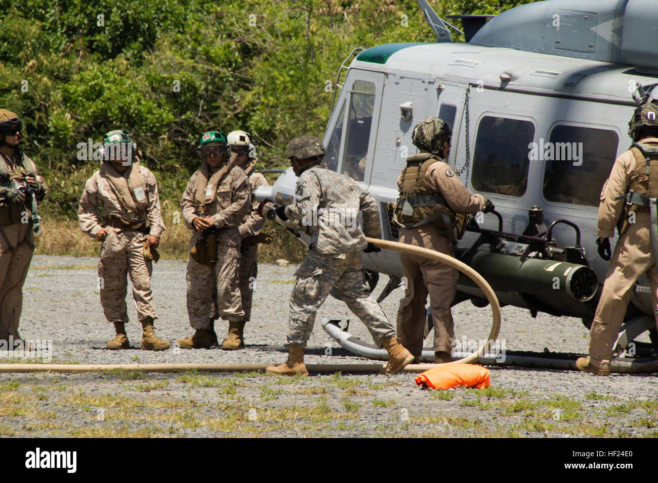 A soldier with 25th Cavalry, 209th Aviation Support Battalion, finishes ...