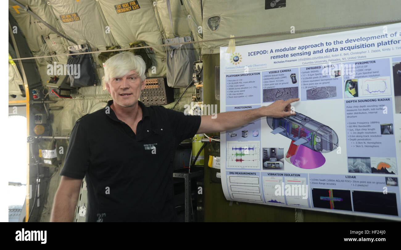 Nick Frearson, a scientist with Columbia University, gives visitors to ...