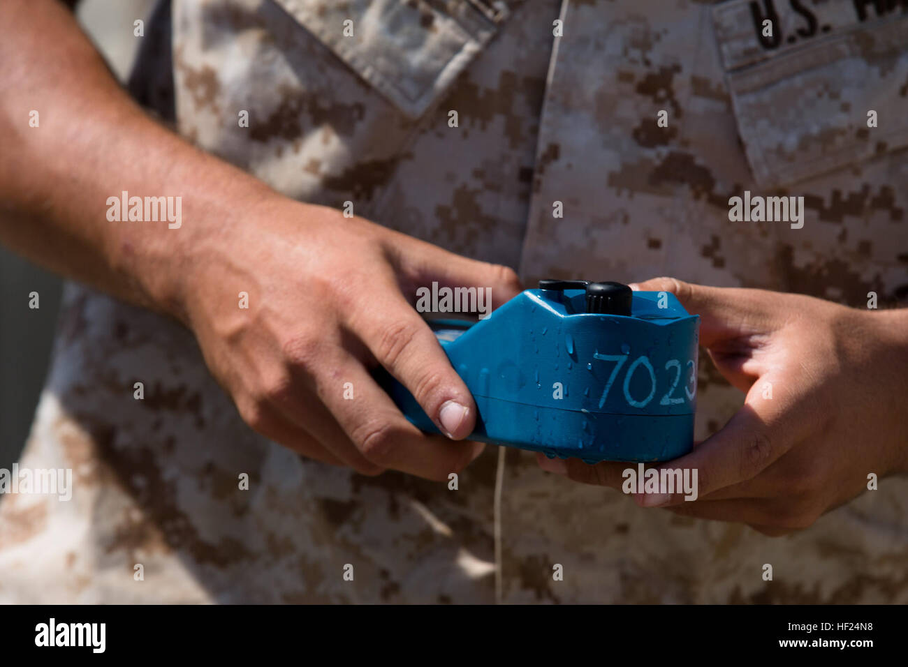 A Marine with 2nd Marine Logistics Group tests the quality of water ...