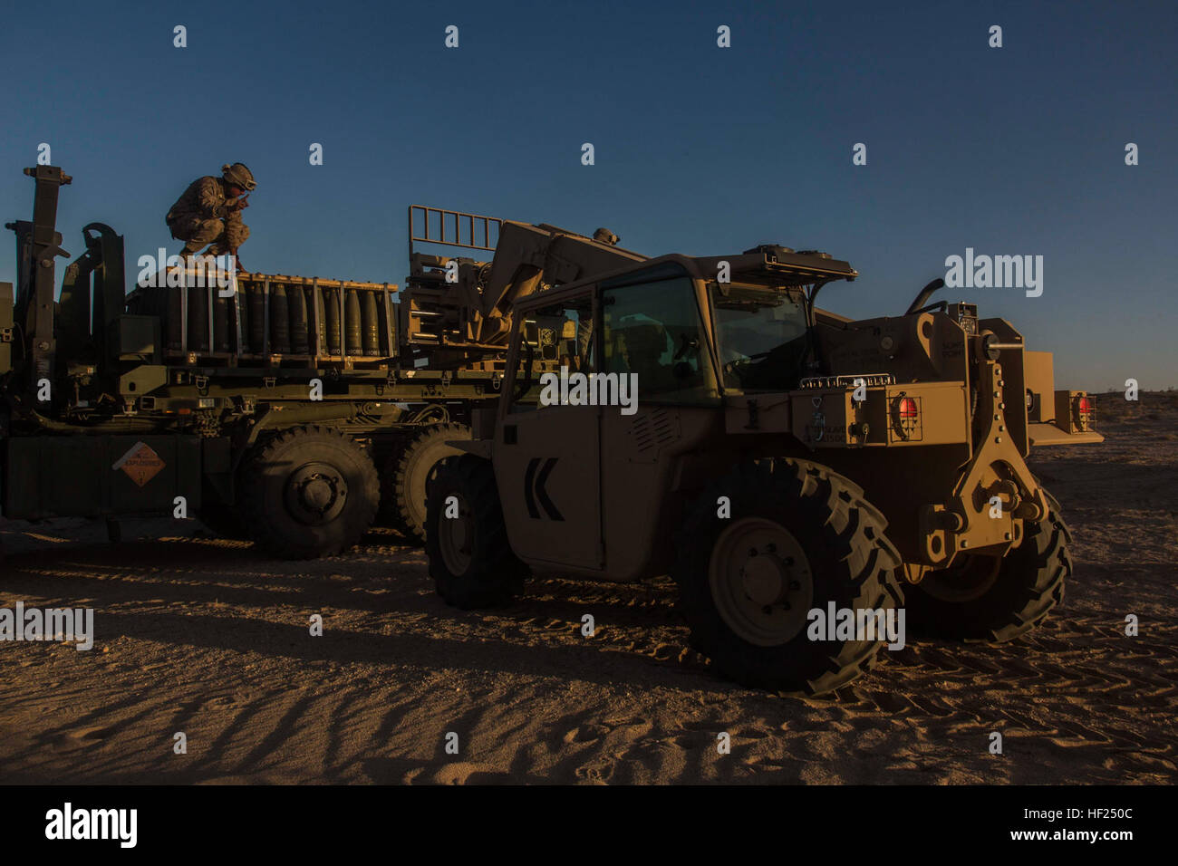 U.S. Marine Corps Lance Cpl. Evan Wolverton, right, with 11th Marine ...