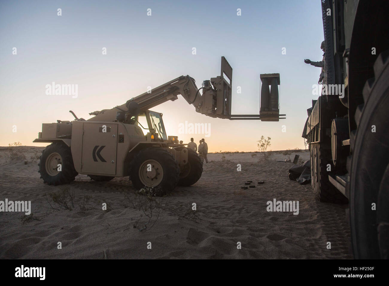 U.S. Marine Corps Lance Cpl. Evan Wolverton, left, with 11th Marine ...