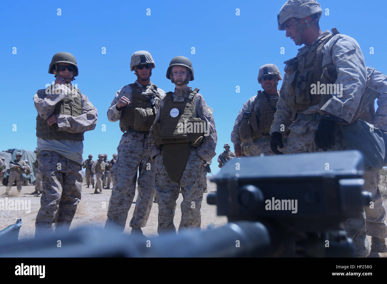 Ryan Forbes, third from left, a 13 year-old native of San Diego, talks ...