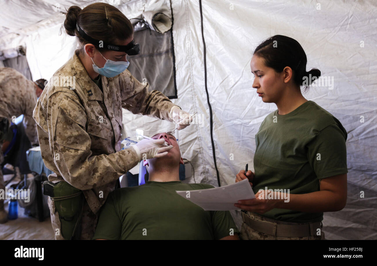 U.S. Navy Lieutenant Jenna M. Richards, (left) a dental officer and HM2 ...