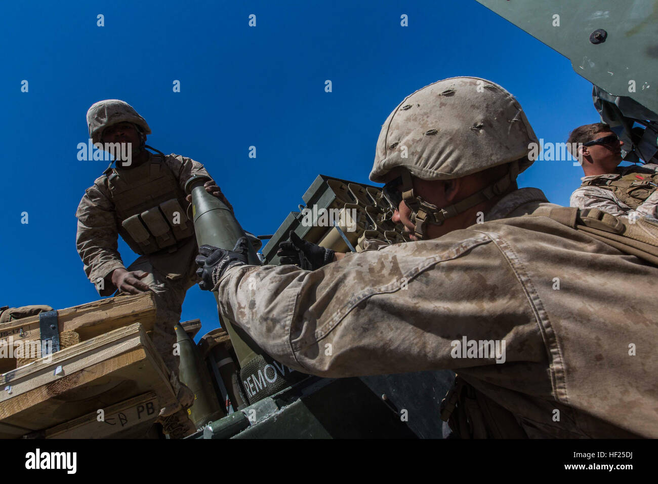 U.S. Marine Corps Pfc. Samuel Reynolds, left, with Bravo Battery, 1st ...