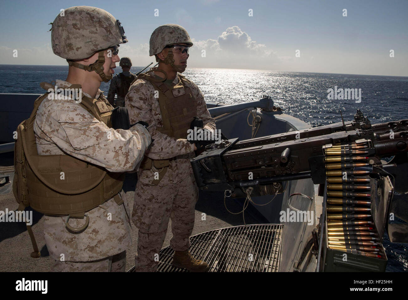 U.S. Marine Corps Lance Cpl. Estevan Romero, right, Combat Logistics ...