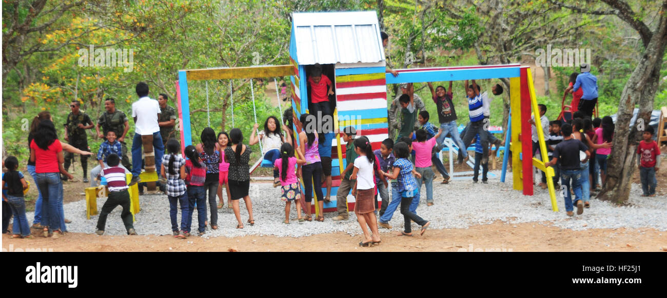 The school children at El Roble play at the new play area for the first ...